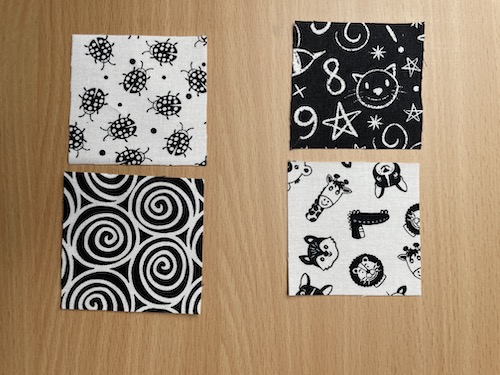 Sort-hvide firkanter med gult i midten. Grindsted restetæppe Gratis DIY